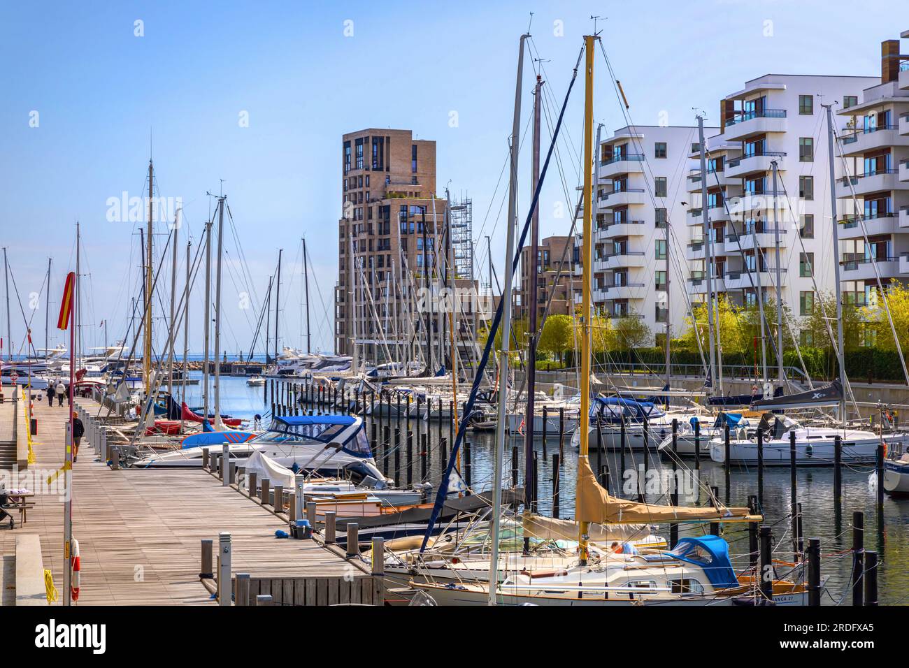 View of the pier with moored yachts and boats in Denmark. Yacht parking ...