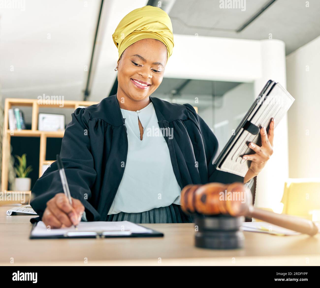 Lawyer, hammer and woman on tablet writing legal notes, checklist and ...