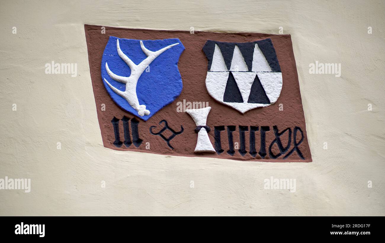 Coat of arms on the wall of an old church Stock Photo - Alamy
