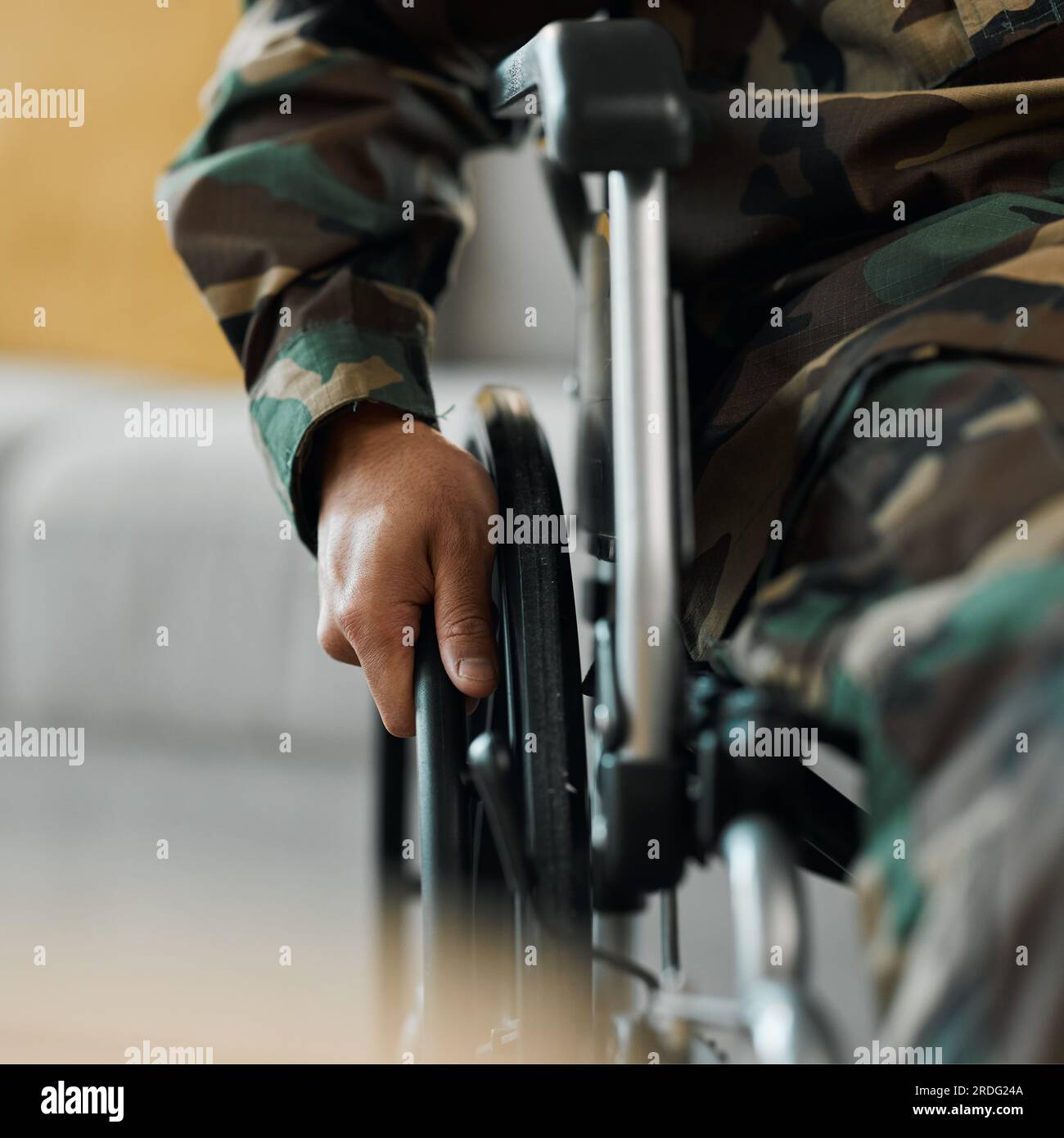 Man, hands and wheelchair in army from accident, war injury or ...