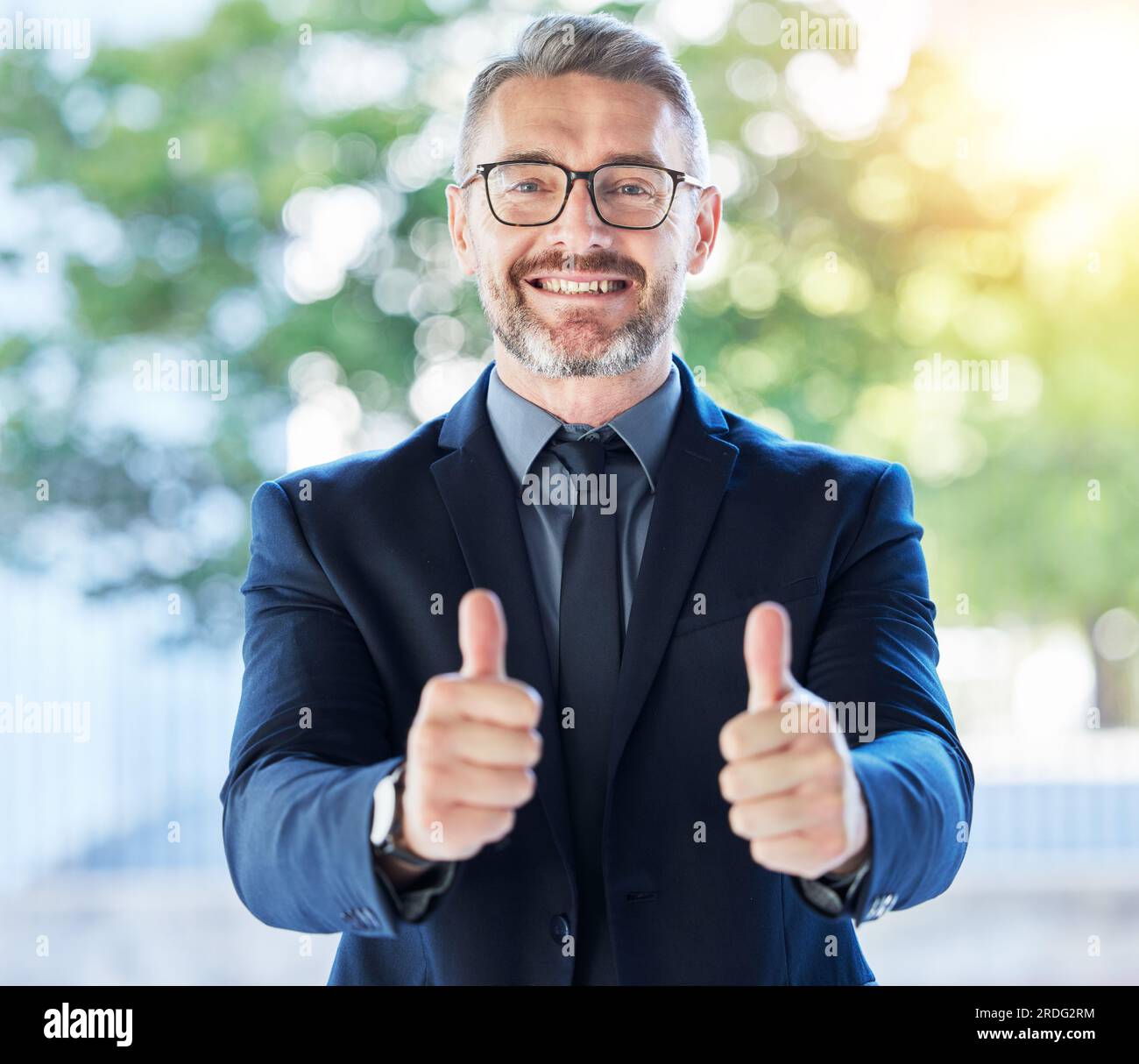 Business man, senior executive and thumbs up, support and agreement in ...