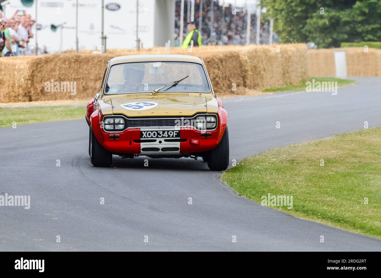 Ford Escort Mk1 race car racing up the hill climb at the Goodwood ...