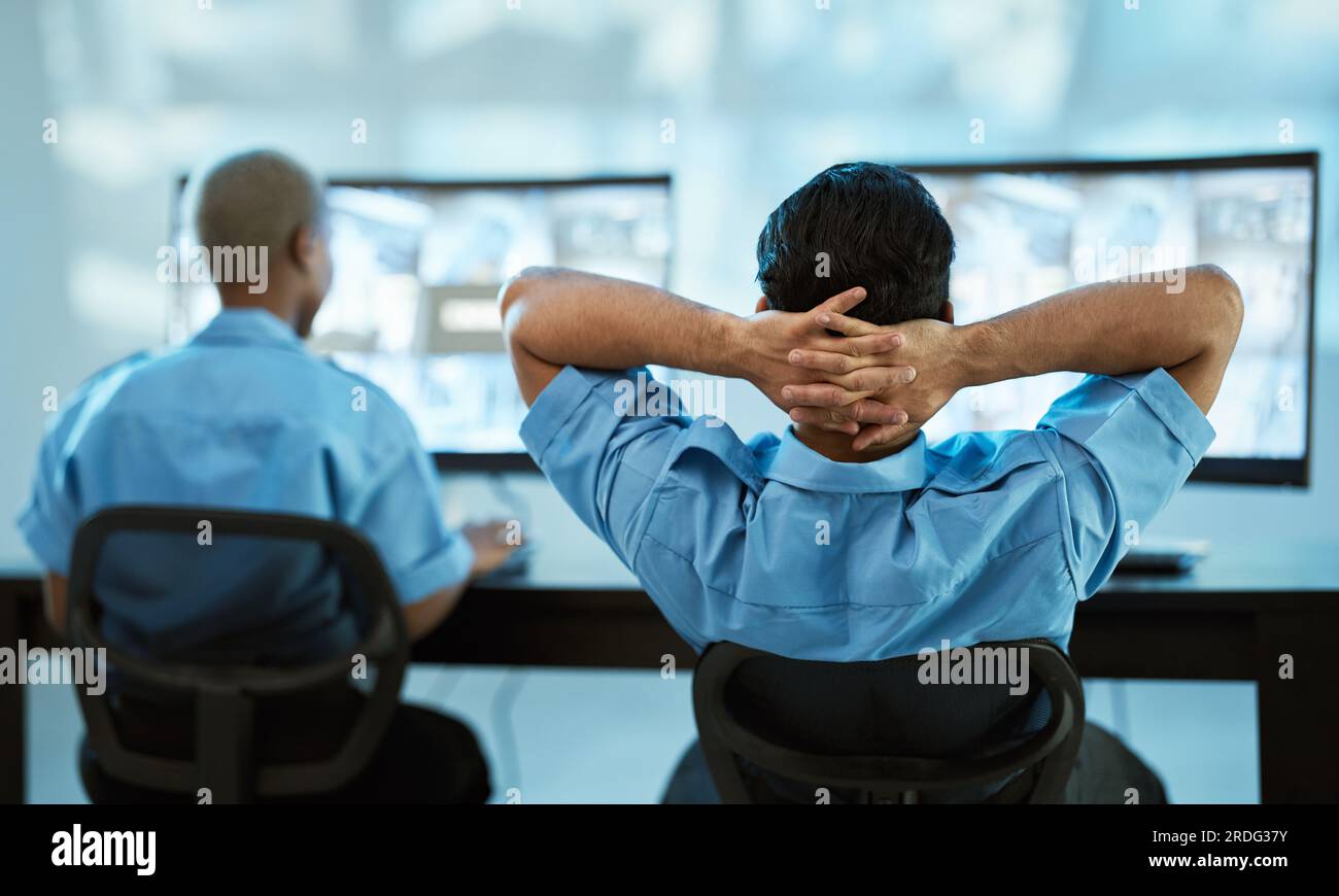 Security guard, safety and team in control room with a computer screen ...
