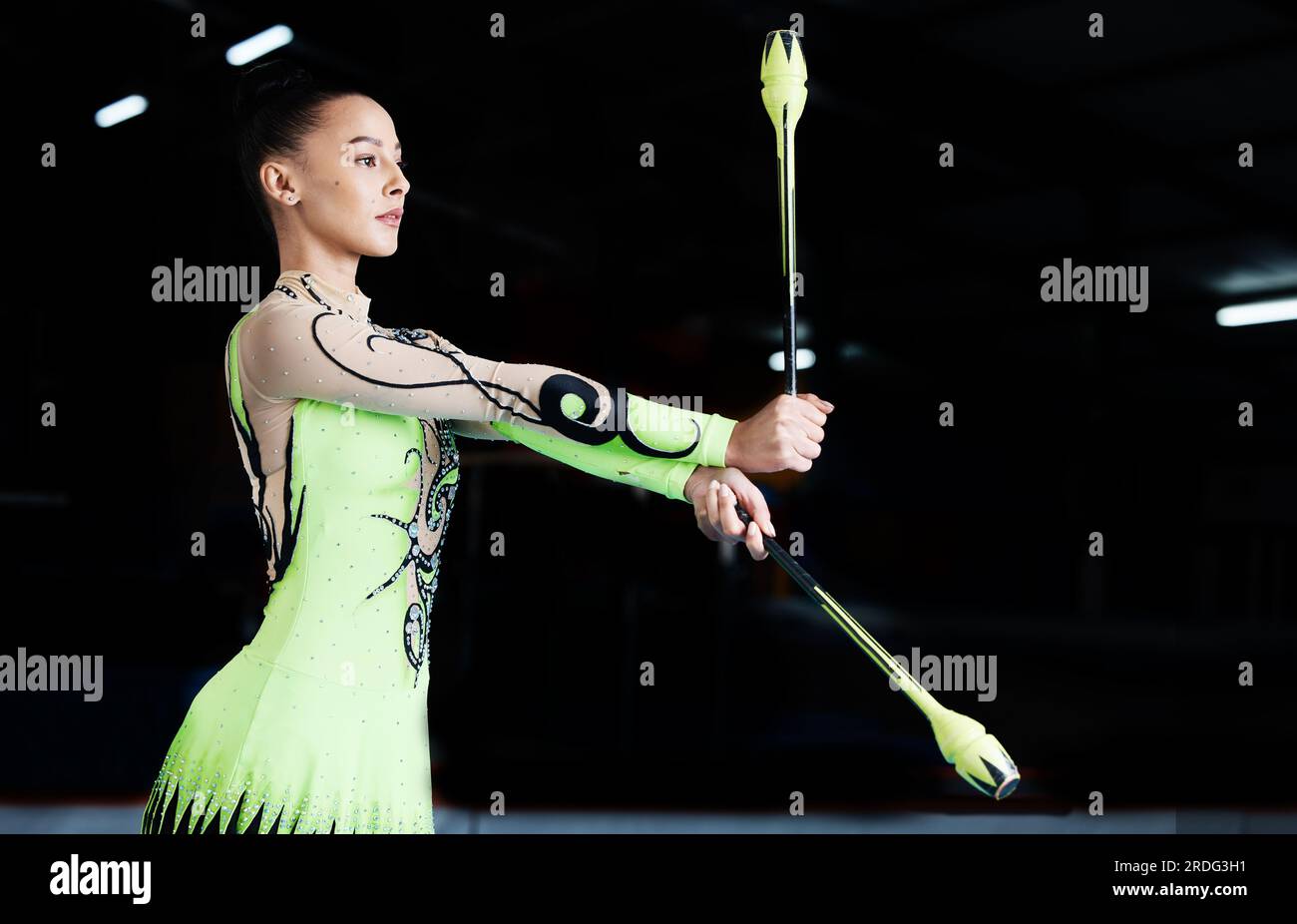 Sports, gymnastics and woman with clubs for performance, rhythmic body ...