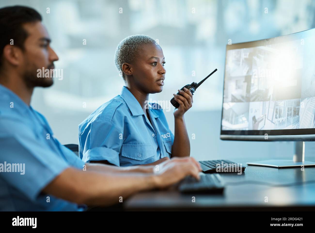 Security guard, safety and control room with a radio and computer ...