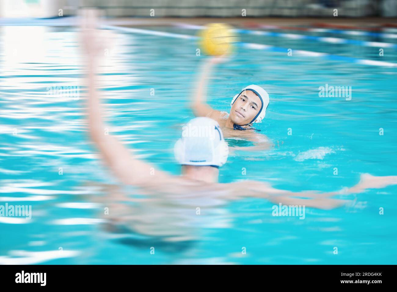 Water polo, shooting ball and people in swimming pool training ...