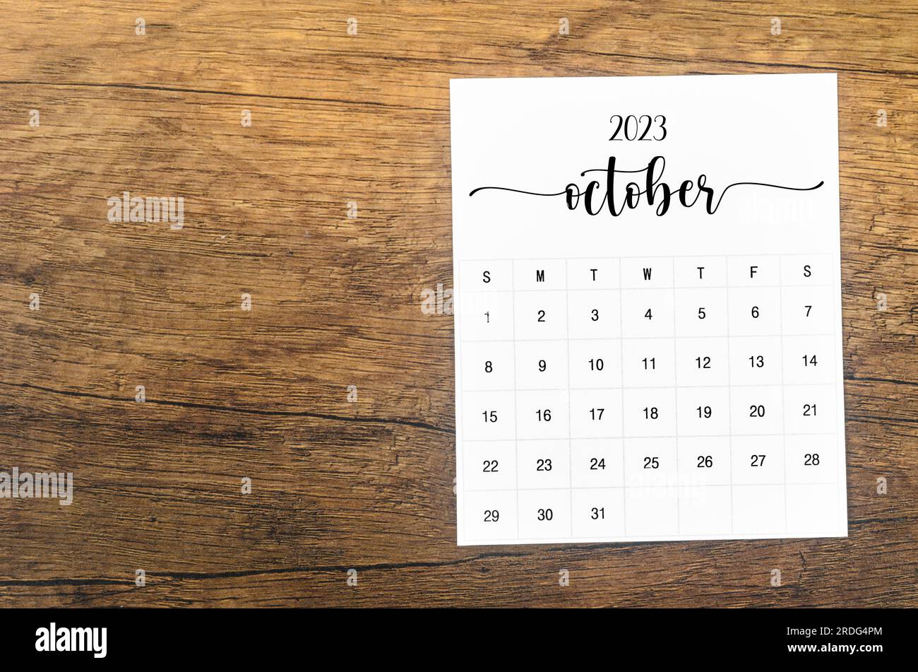 October 2023 Monthly calendar for 2023 year on wooden background Stock ...