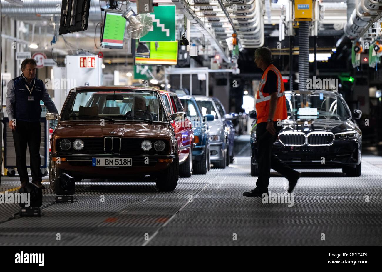Dingolfing, Germany. 21st July, 2023. Various old generations of BMW 5 ...