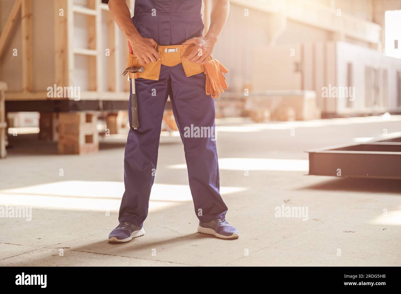 Male builder standing inside building under construction Stock Photo ...