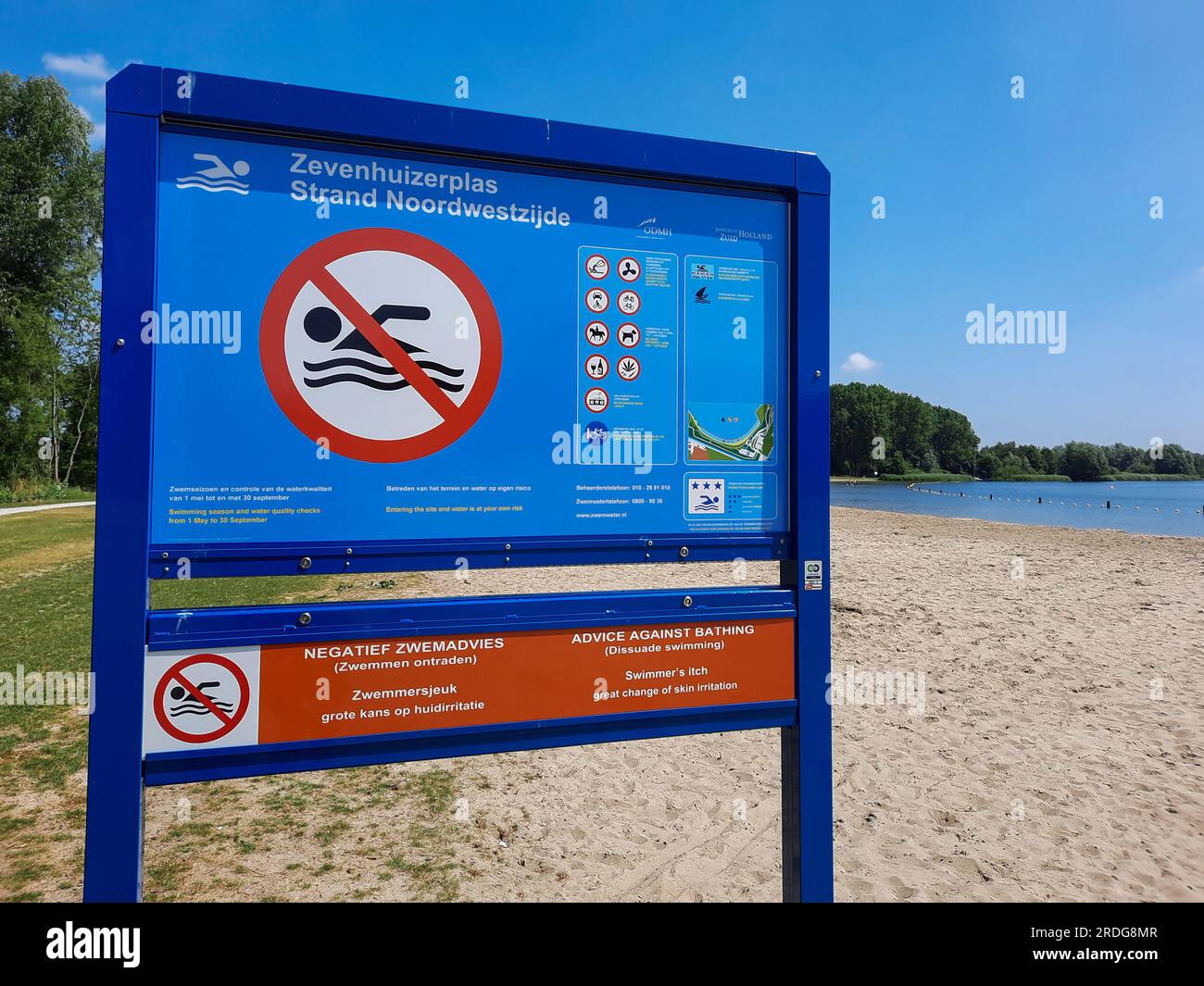 Warning signs at Zevenhuizerplas for Zwemmersjeuk (Swimmer's itch, also ...