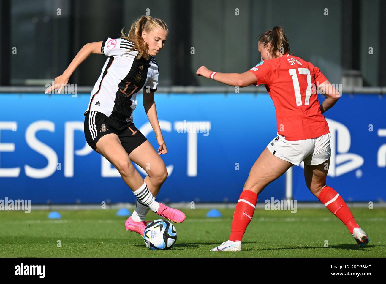 Paulina Bartz (17) of Germany pictured fighting for the ball with Laura Spinn (17) of Austria ...