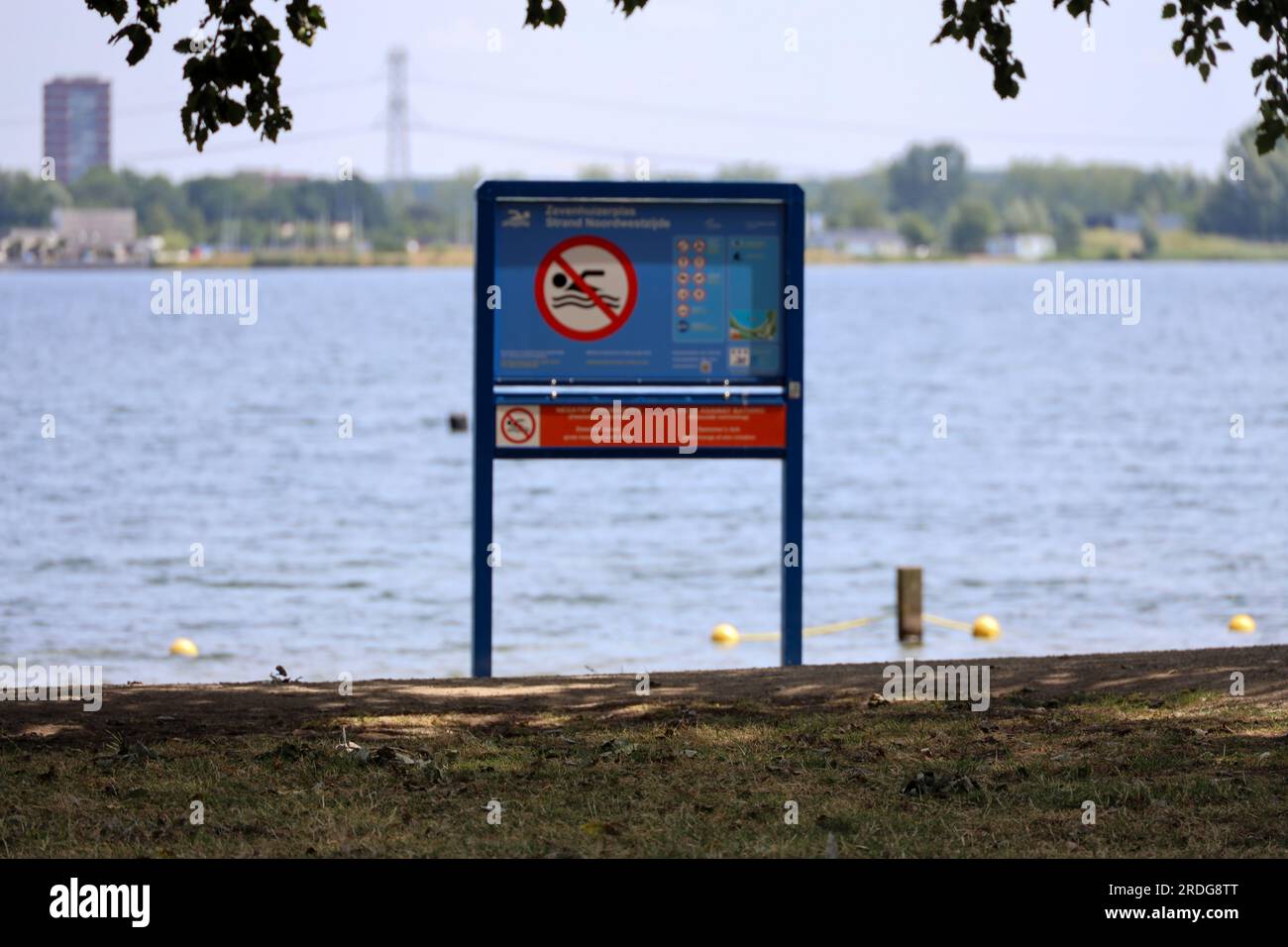 Warning signs at Zevenhuizerplas for Zwemmersjeuk (Swimmer's itch, also ...