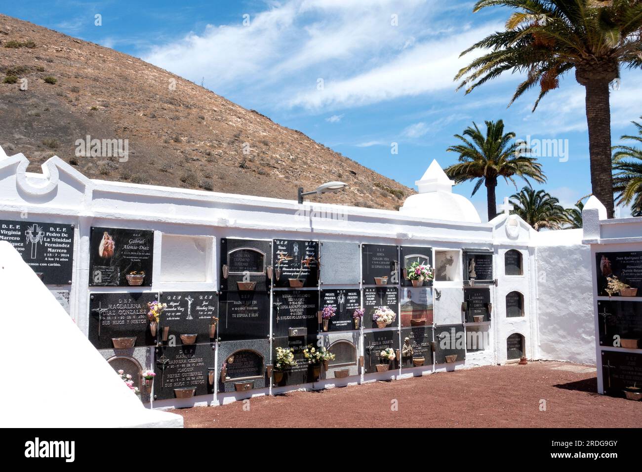 Interment method in a village cemetery, slots in a wall, on the island ...