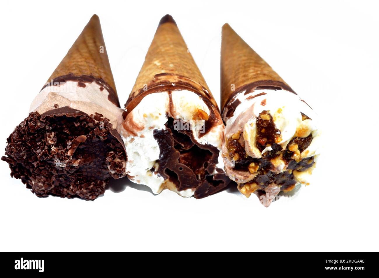 Ice cream vanilla and chocolate cones with topping of chocolate and ...