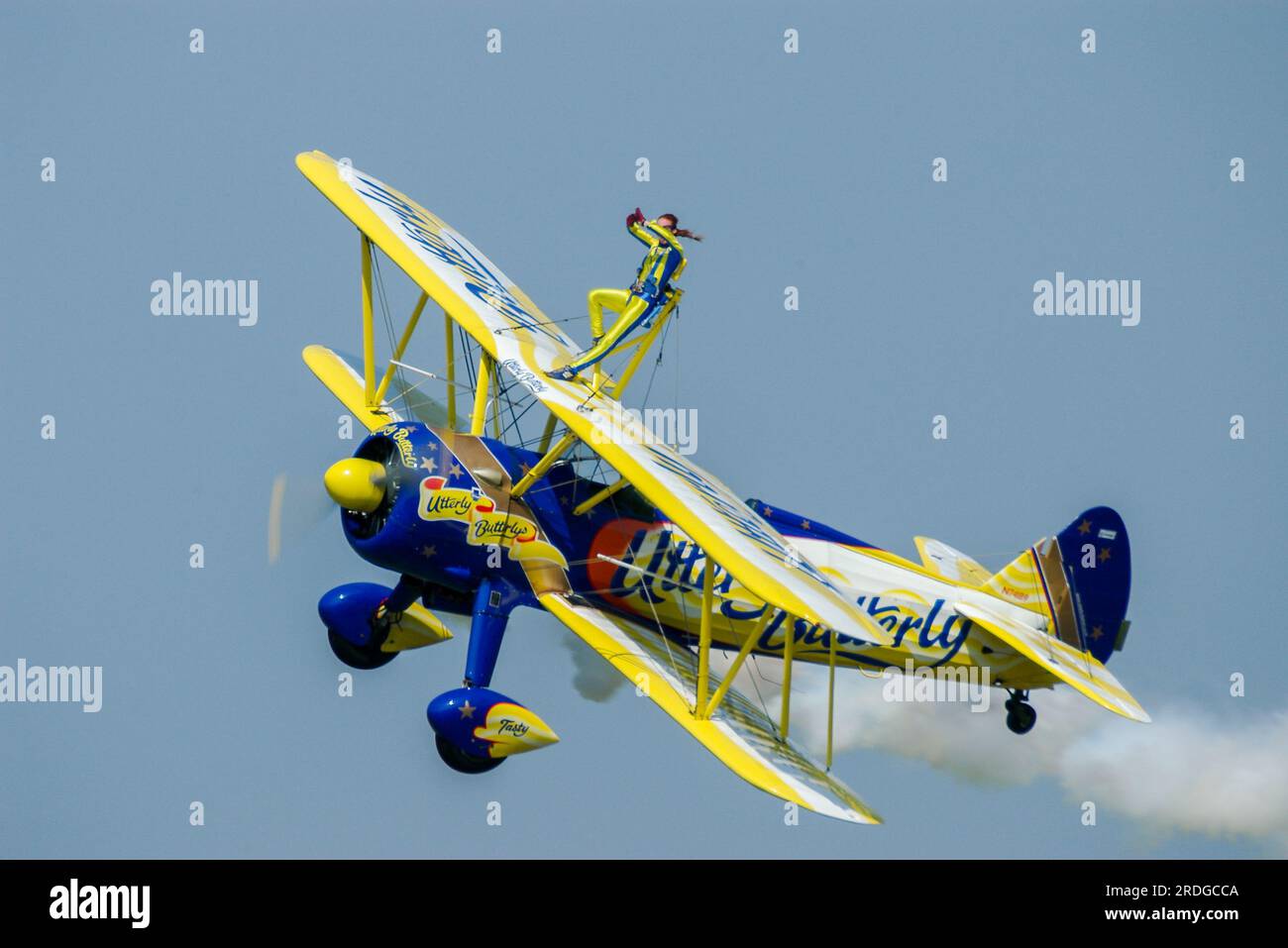Aerosuperbatics Utterly Butterly wingwalkers display team flying at ...