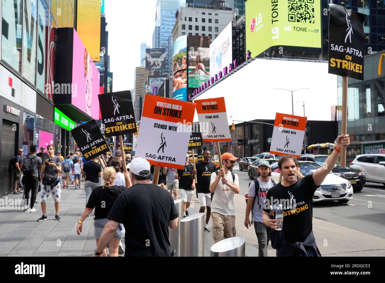Picketers carry signs outside Paramount in Times Square on Friday, July ...