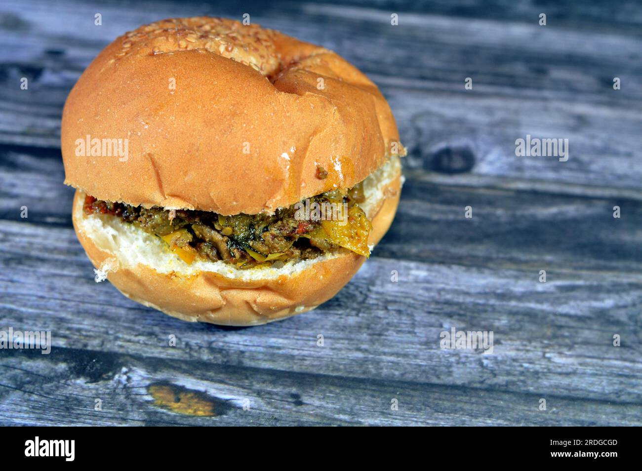 Beef meat shawarma sandwich in a sesame bun, a popular Middle Eastern ...