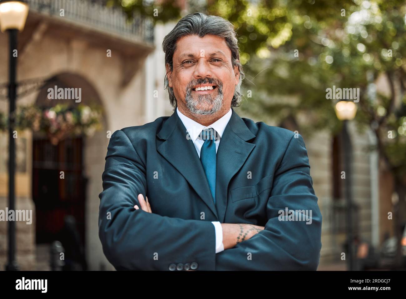 Senior man, executive with arms crossed and smile in portrait outdoor ...
