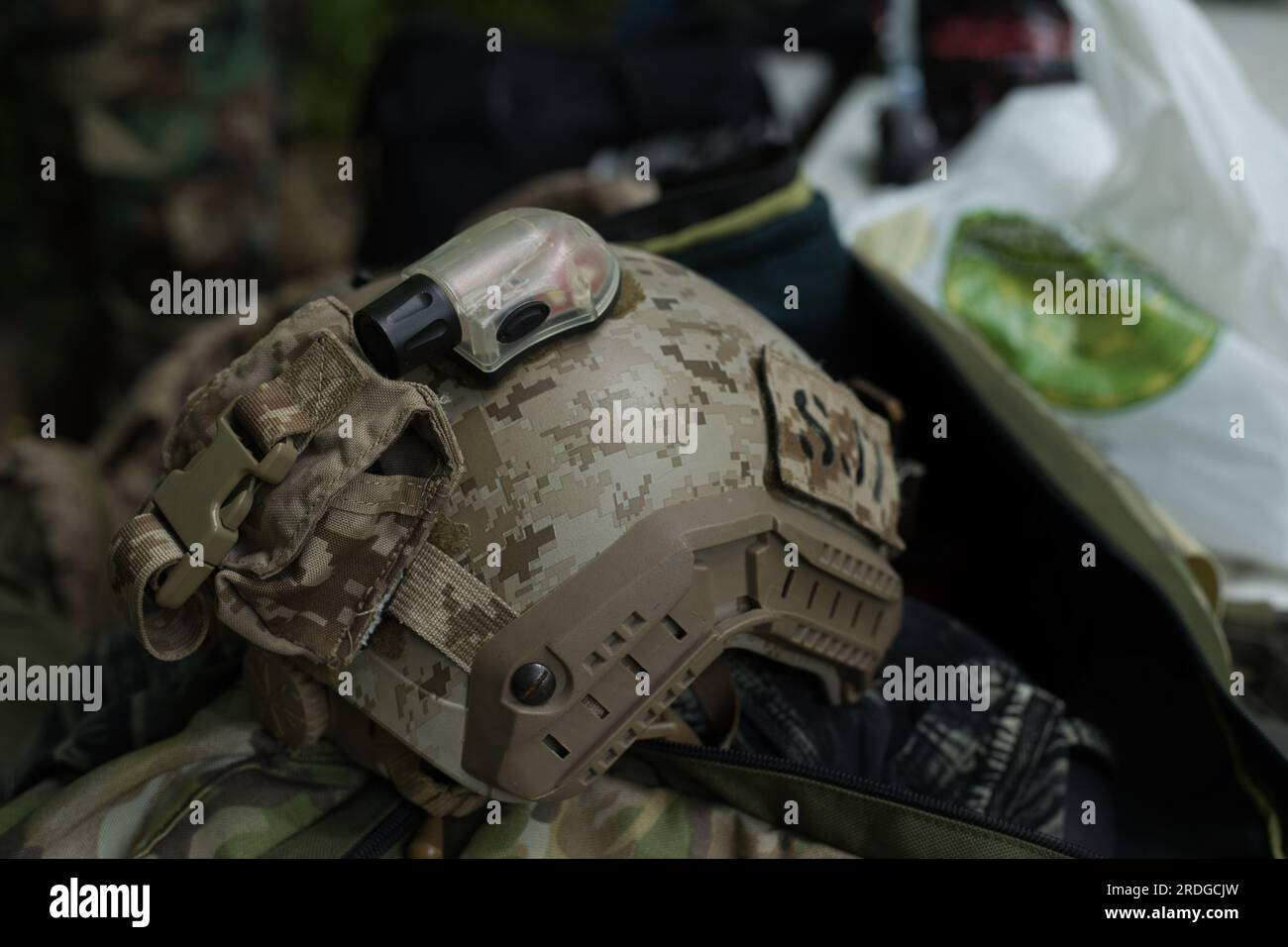 the helmet lies on the table in aor color Stock Photo - Alamy