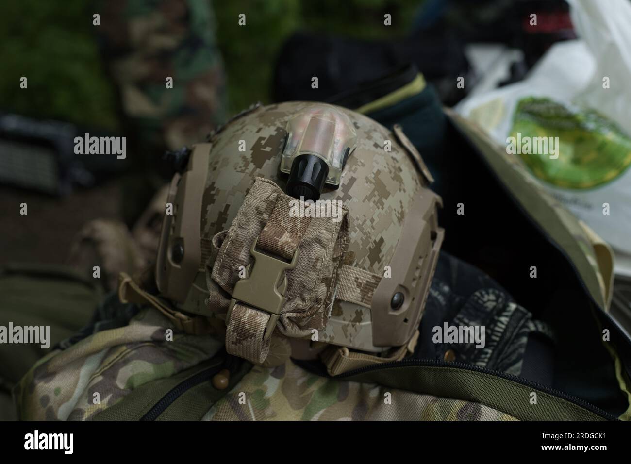 the helmet lies on the table in aor color Stock Photo - Alamy