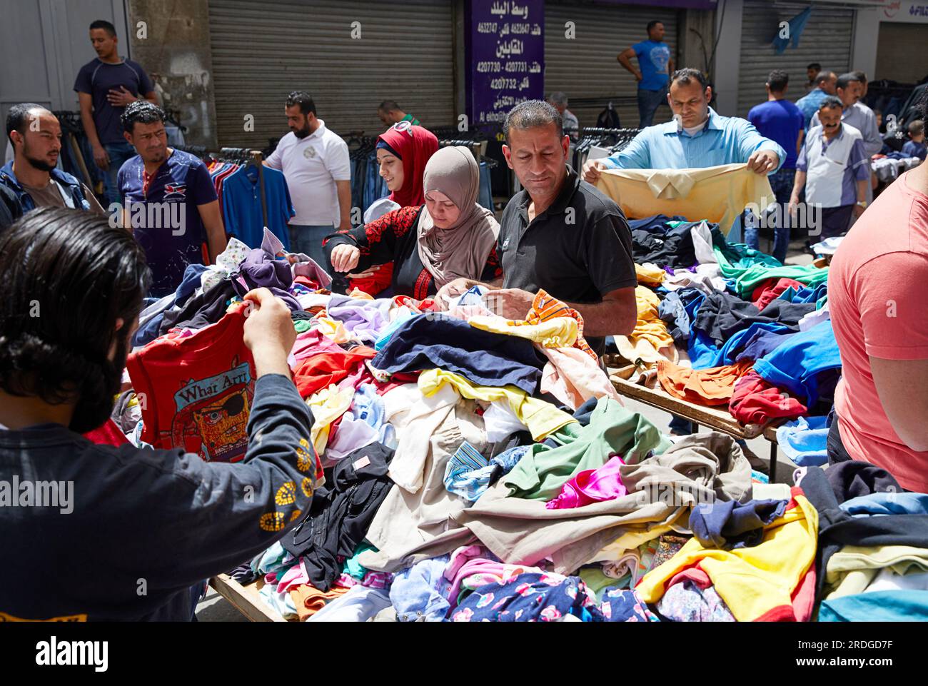 People looking at clothes, Clothes market, Downtown Amman market, Amman ...