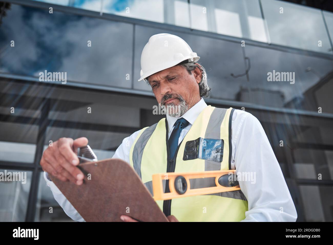 Engineering, checklist and man for construction site inspection ...