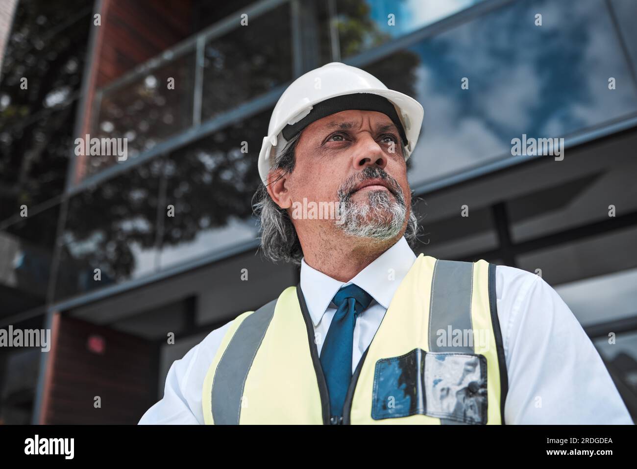 Thinking, ideas and engineering man at outdoor building, construction ...