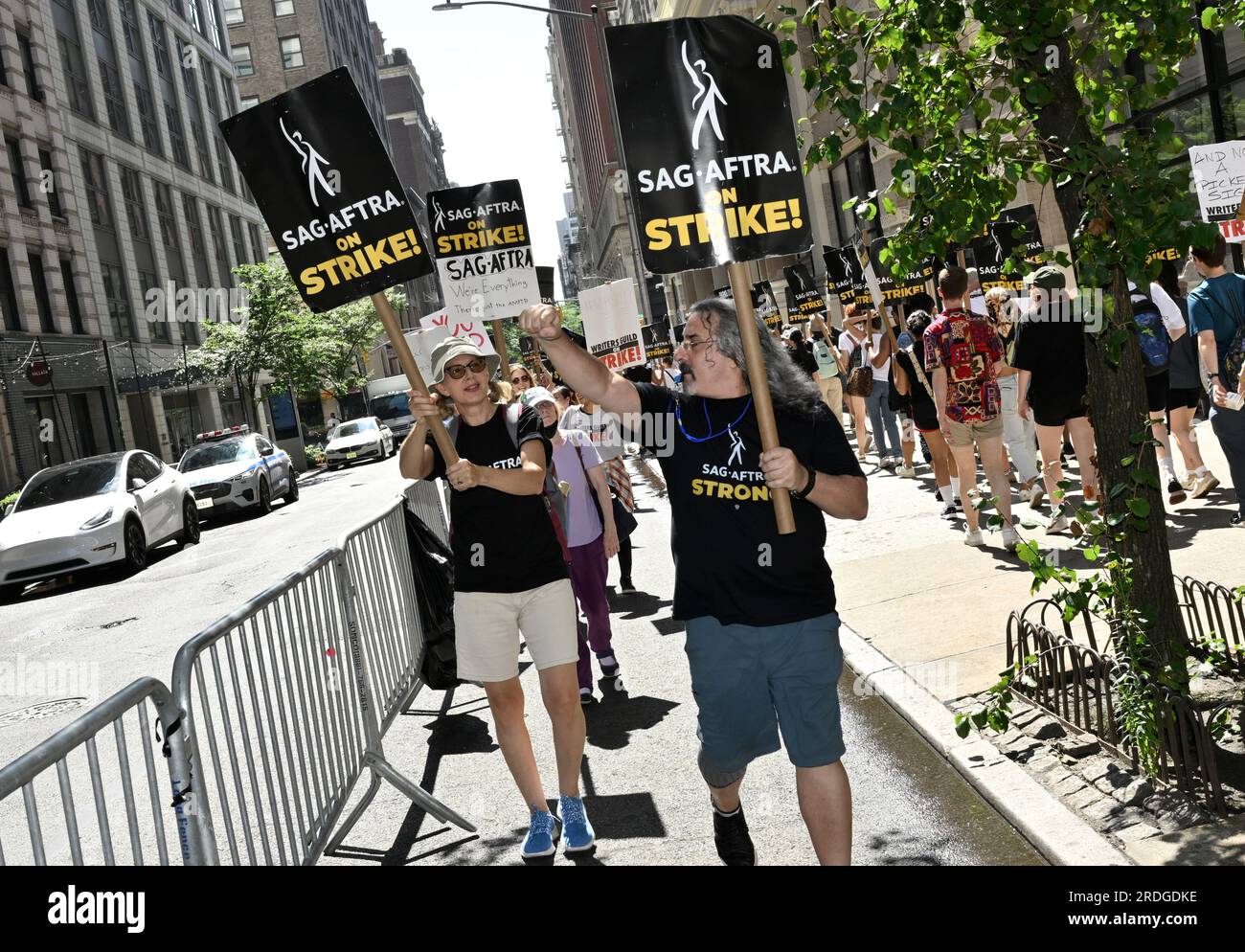 Picketers carry signs outside Netflix on Friday, July 21, 2023, in New ...