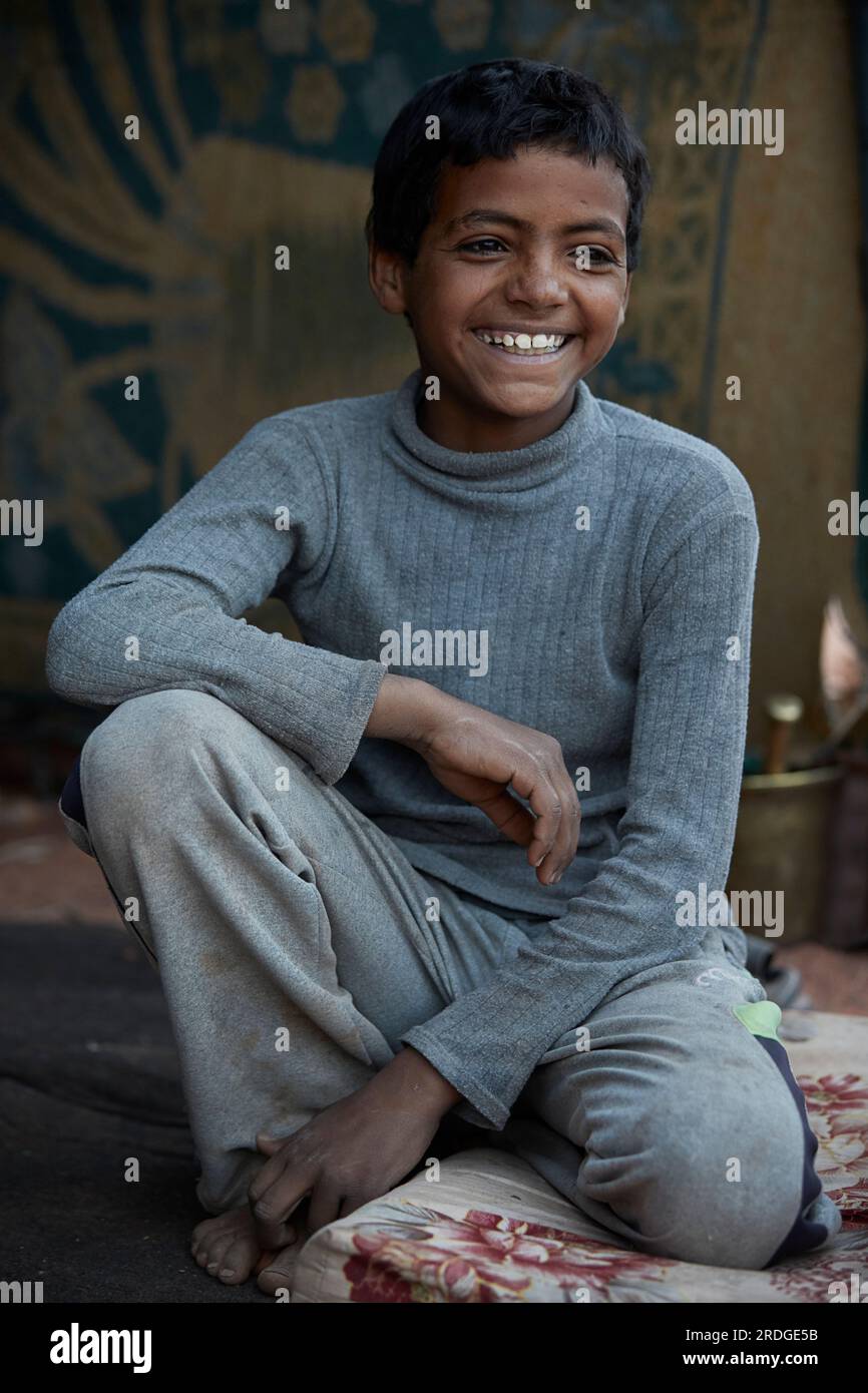 Portrait of Bedouin boy smiling, Wadi Rum, Aquaba, Jordan Stock Photo ...