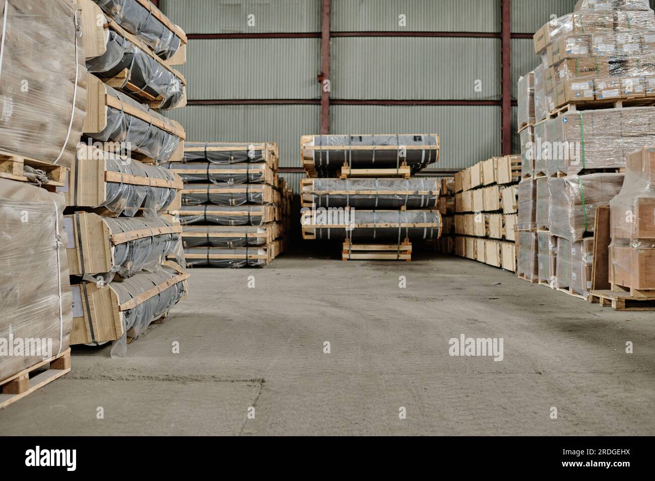 Horizontal image of big storage room with packed containers on pallets ...