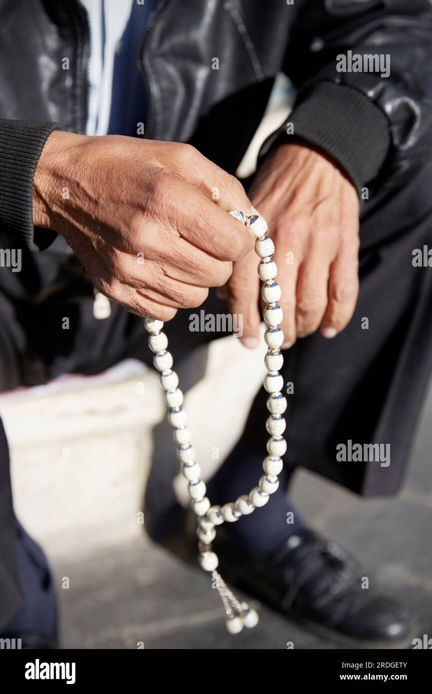 Prayer beads in mand hands, Amman, Jordan Stock Photo - Alamy