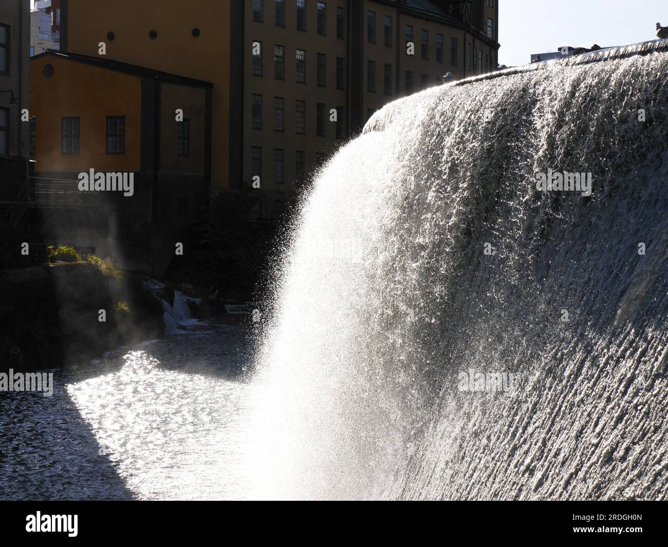 A waterfall at old industrial buildings Stock Photo - Alamy