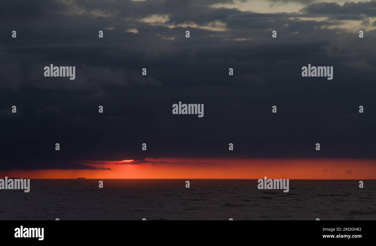 Sunset Behind Dark Threatening Stormy Sky Over The Wash, Snettisham ...