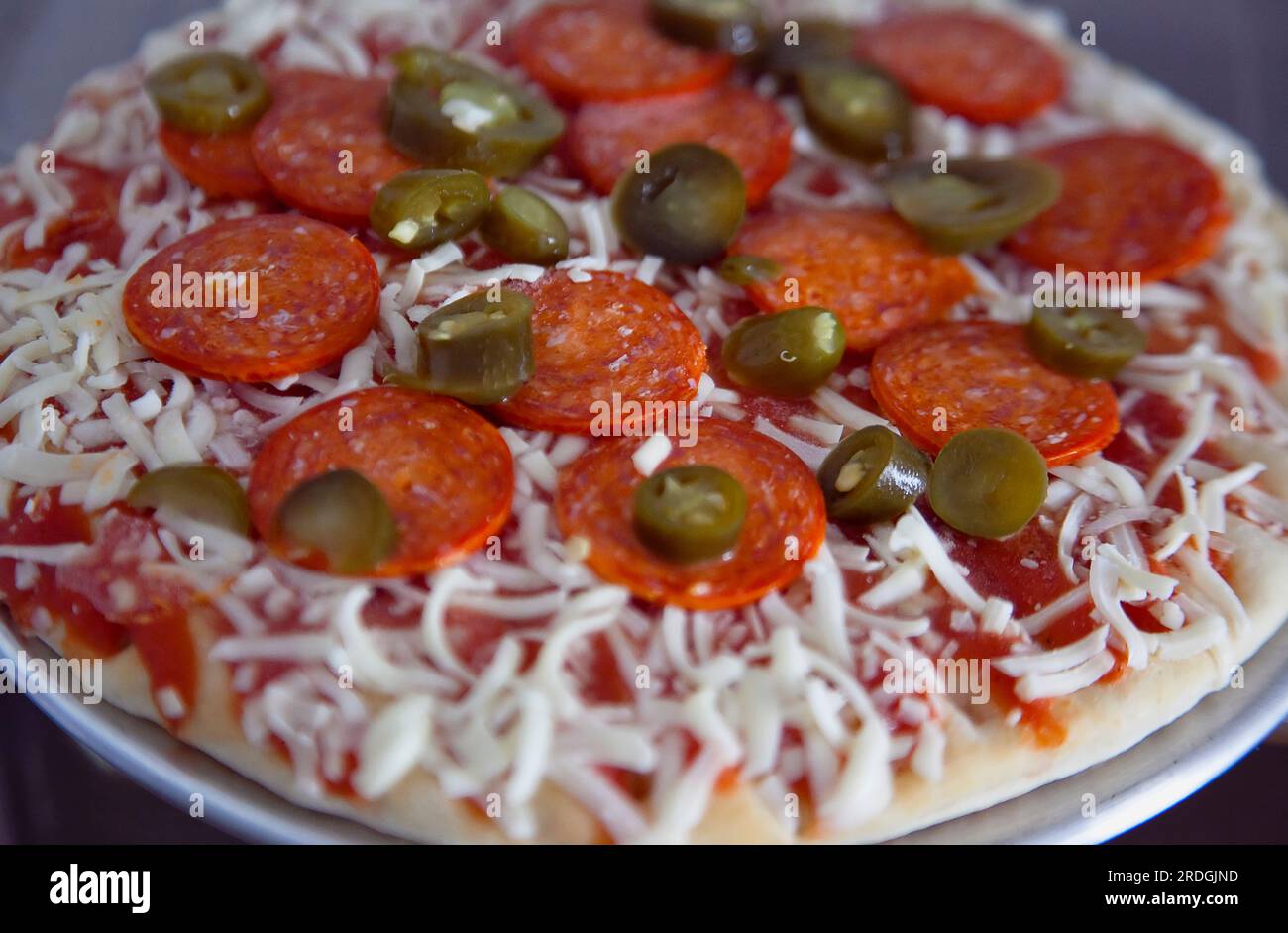 Food, Cooked, Pizza, Frozen pepperoni and jalapeno pizza on metal tray ...