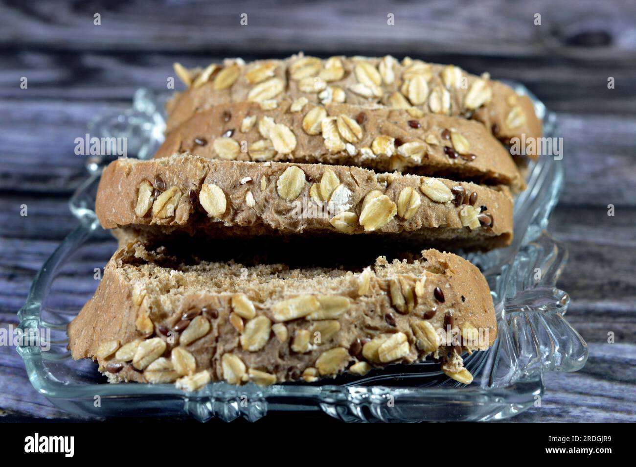 wheat oat fresh baked pieces bun cut topped with oats and sesame, The ...
