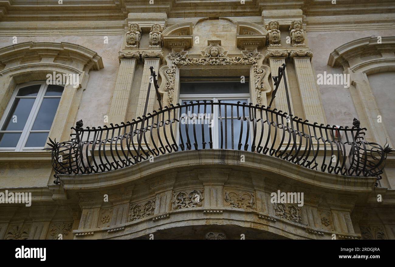Antique Rococo style building facade in Noto Sicily, Italy Stock Photo ...