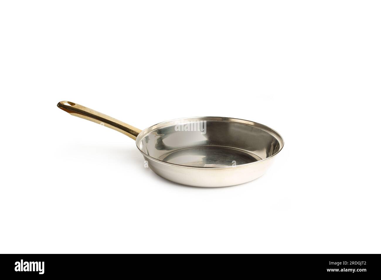 A stainless steel frying pan on a white background with copy space ...
