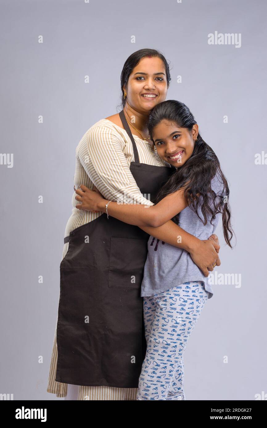 Indian women chef, potrait of a lady wearing apron with white ...