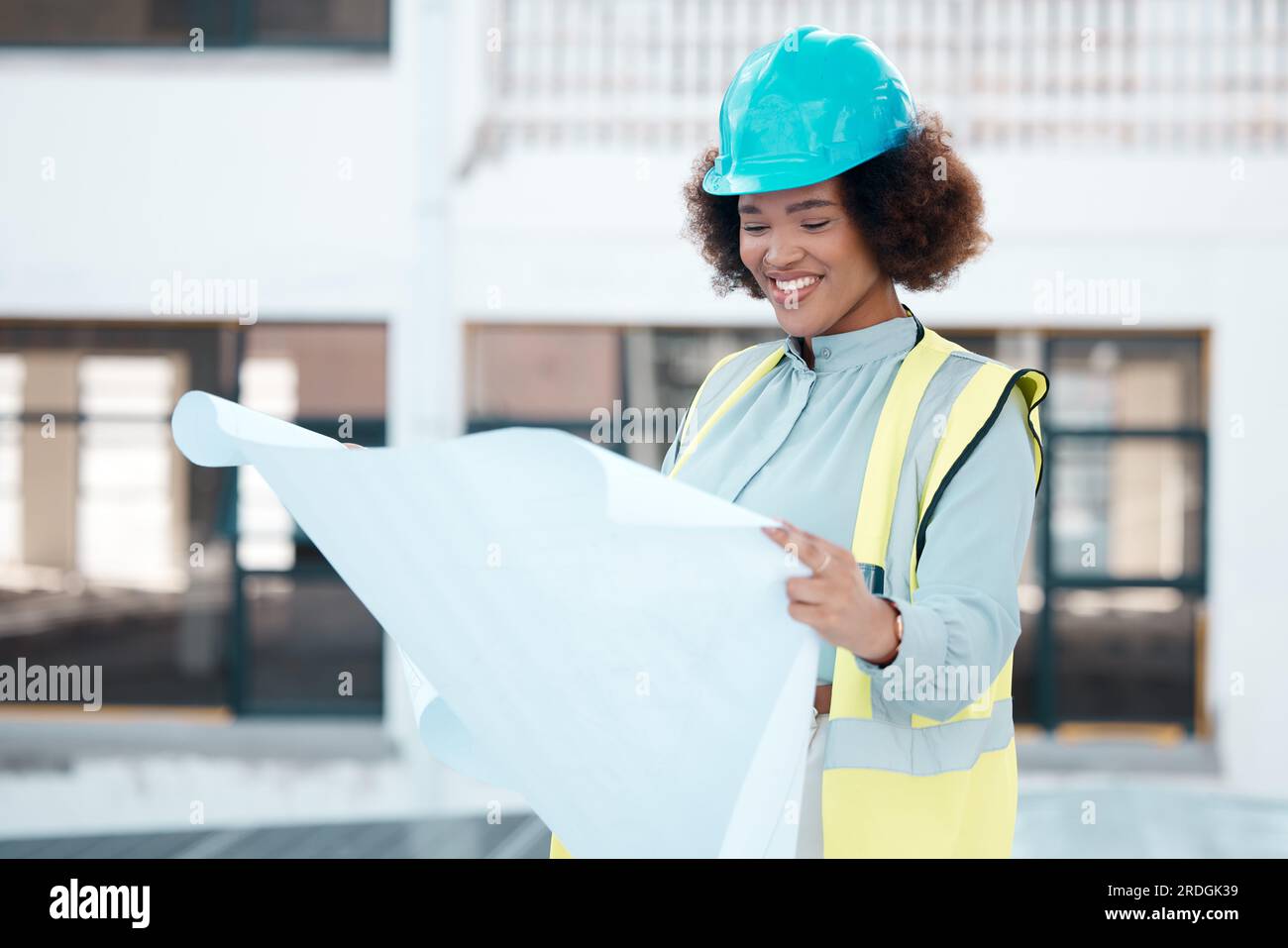 Smile, engineer and woman with blueprint in city for construction ...