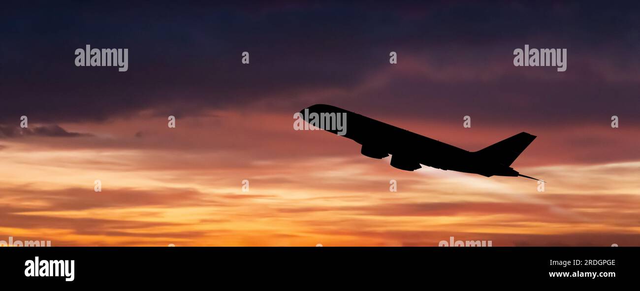 Passanger plane flying. Airliner in the sky Stock Photo - Alamy