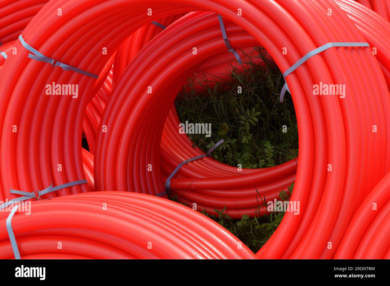 Cable protective pipe for an underground utilities Stock Photo - Alamy