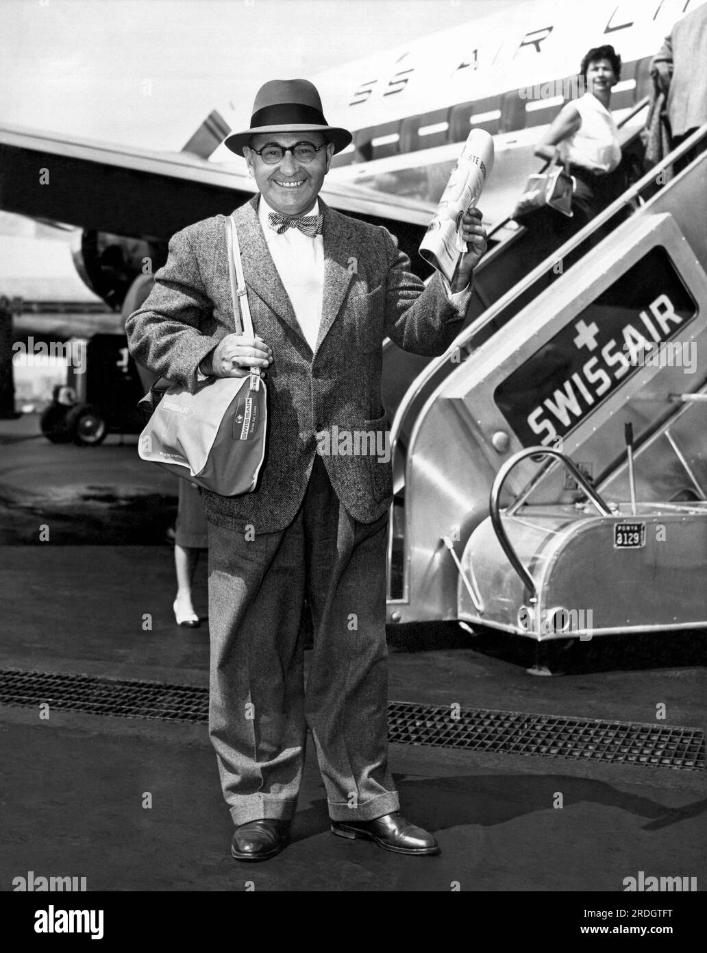 San Francisco, California: June, 1953. A happy man prepares to board a ...