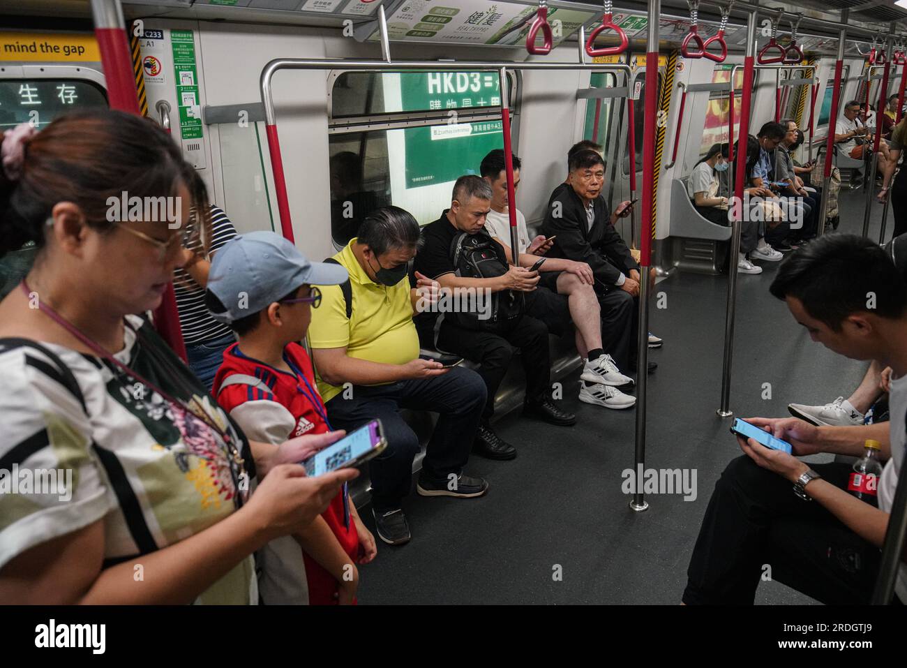 People take on a subway train Stock Photo - Alamy