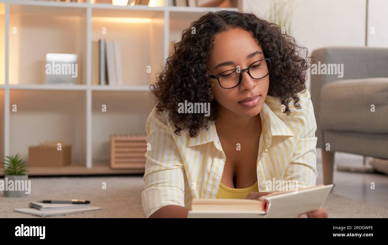 Reading student book study woman learning home Stock Photo - Alamy