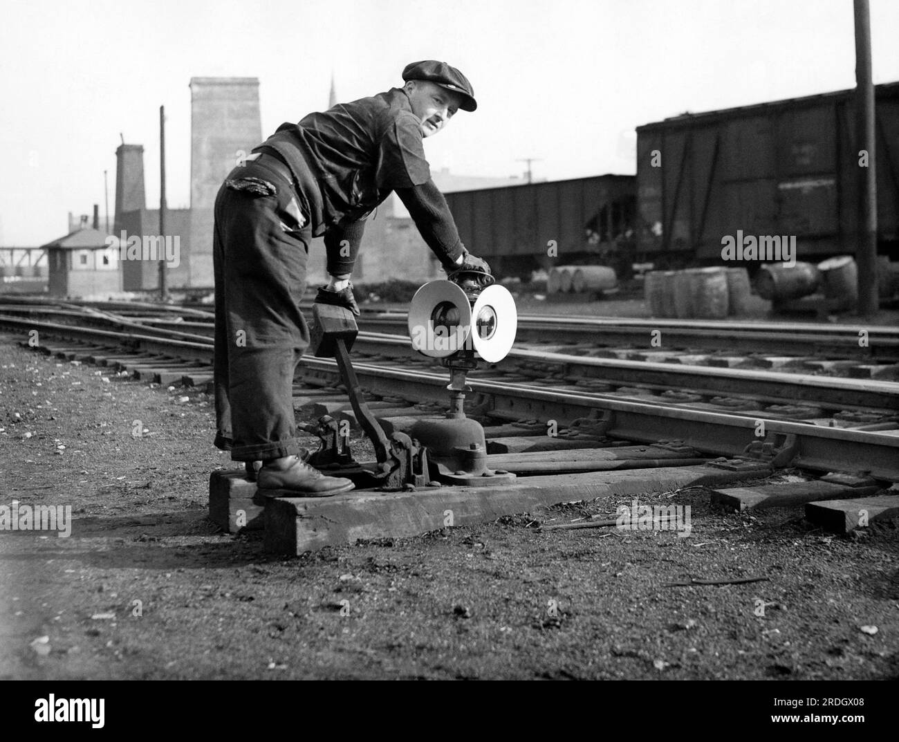 United States c. 1930 A switch man in a railroad yard Stock Photo - Alamy