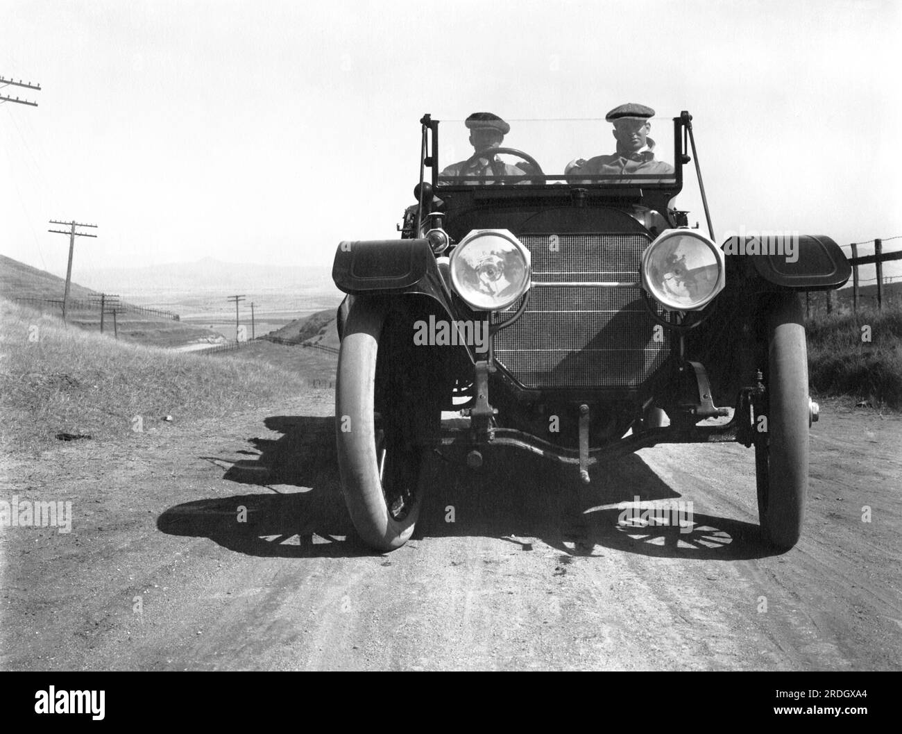Man driving car on highway Black and White Stock Photos & Images - Alamy