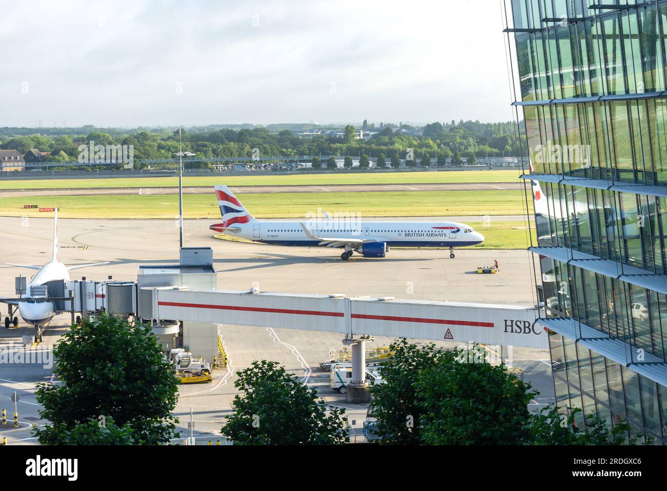 British Airways Airbus A321 arriving at Terminal 5, Heathrow Airport. London Borough of ...