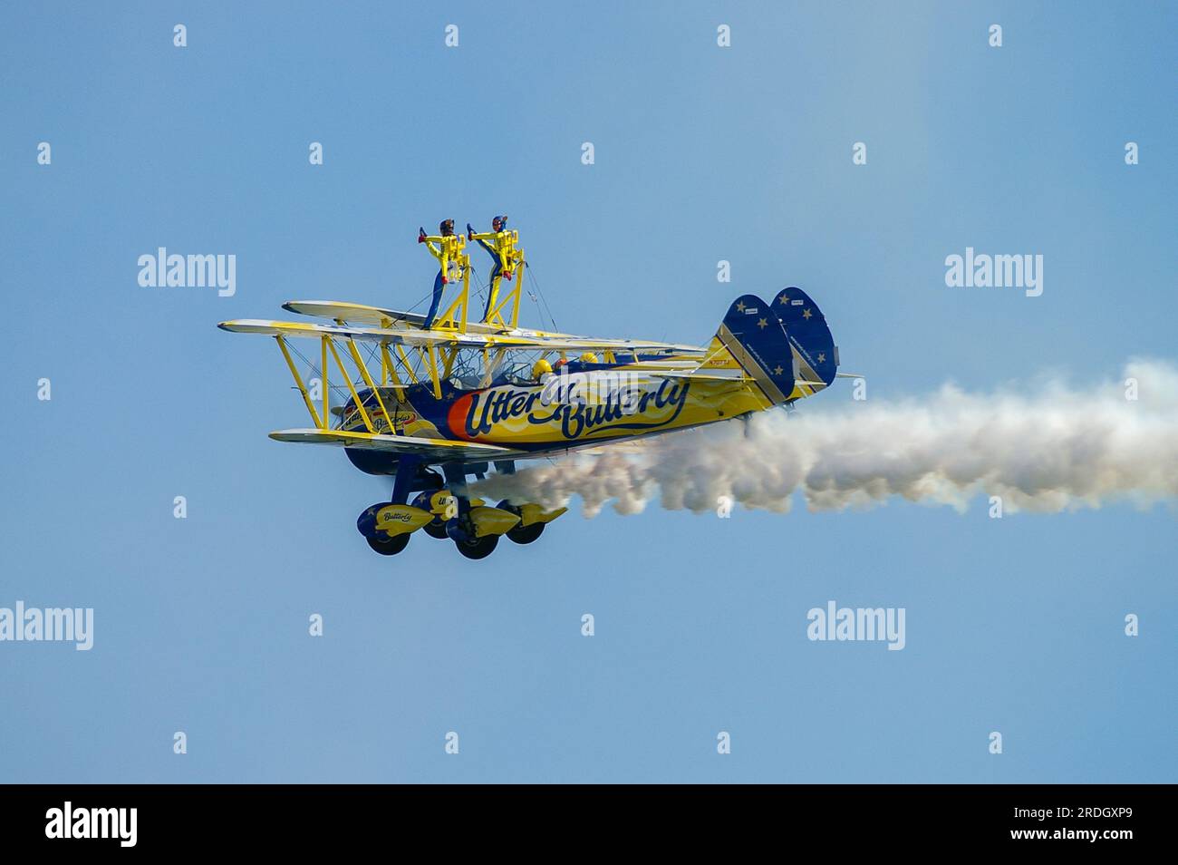 Aerosuperbatics Utterly Butterly wingwalkers display team flying in ...