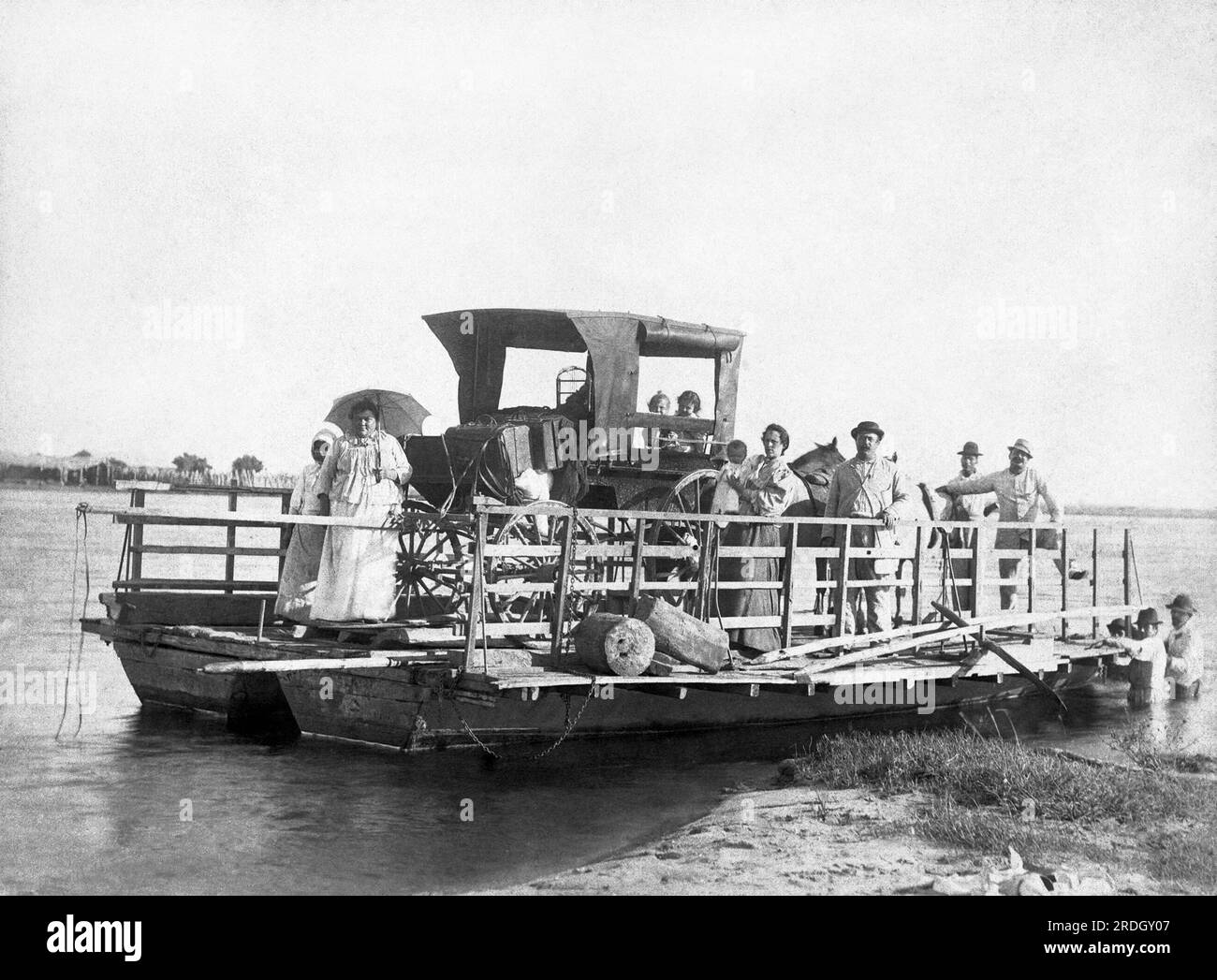 United States: c. 1880 Passengers on a ferry with a wagon and a horse ...