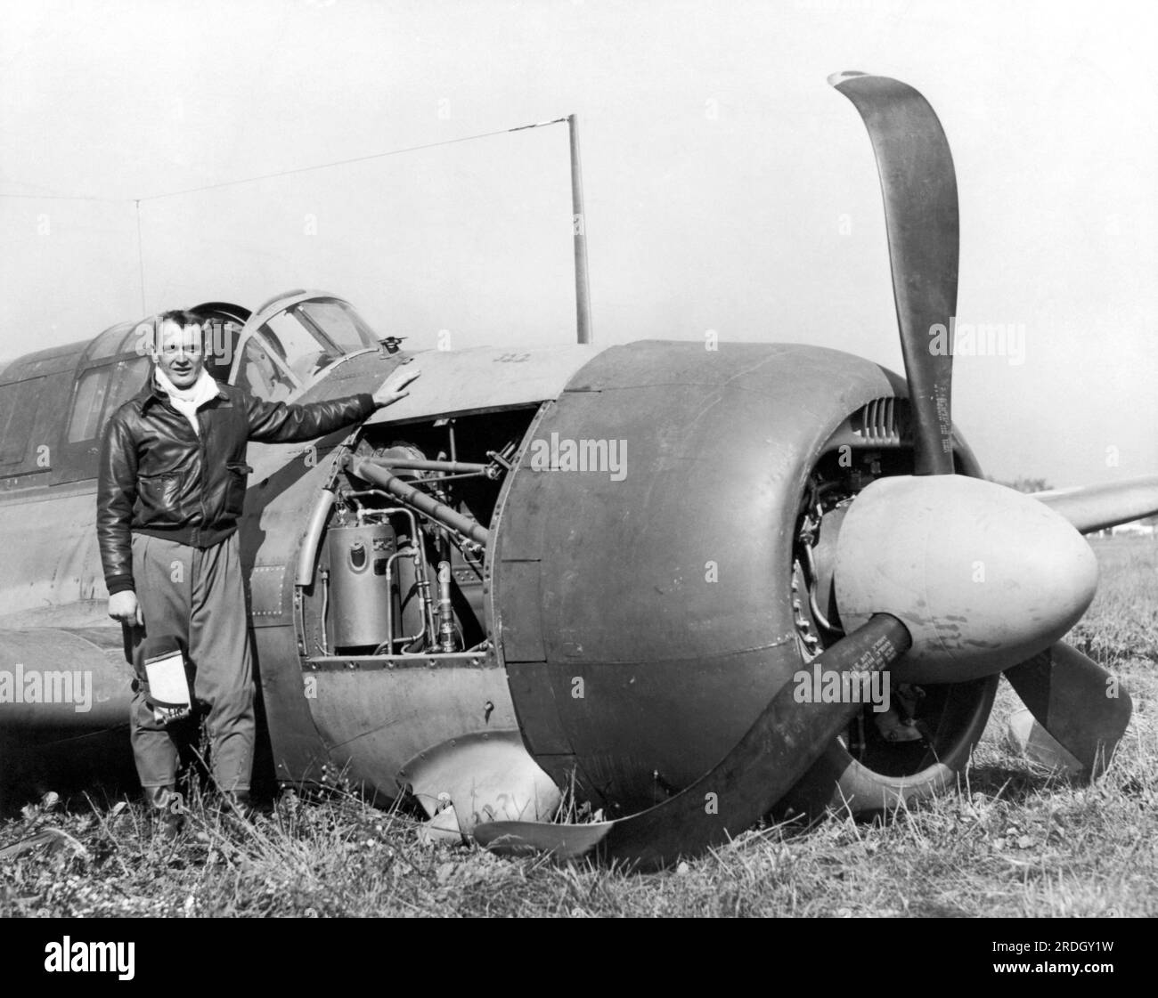 Ohio: September 22, 1943 A pilot standing next to the airplane that was ...